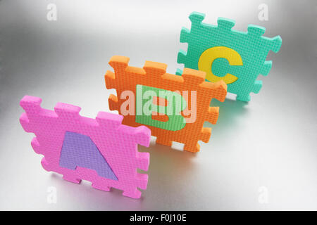foam alphabet puzzle mat Stock Photo - Alamy