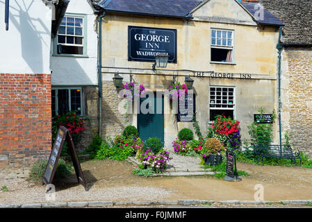 Pub sign of the George Inn, in the village of Lacock, Wiltshire ...