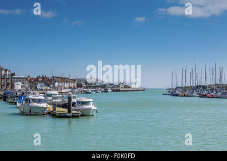 Littlehampton harbour at hight tide looking inland Stock Photo - Alamy