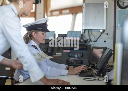 Two female deck officers on bridge Stock Photo - Alamy
