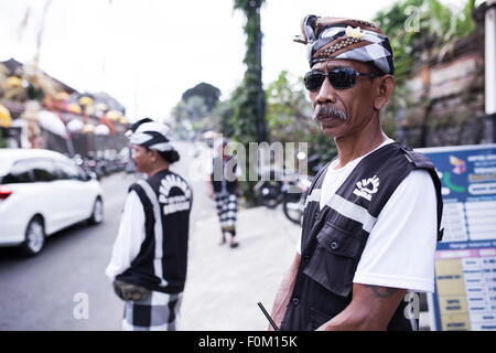 Balinese security guards Pecalang, Bali Stock Photo - Alamy