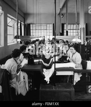 1950s, historical, women working in a radio manufacturing factory ...