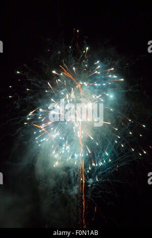 Fireworks in evening sky during celebration for New Year Stock Photo ...