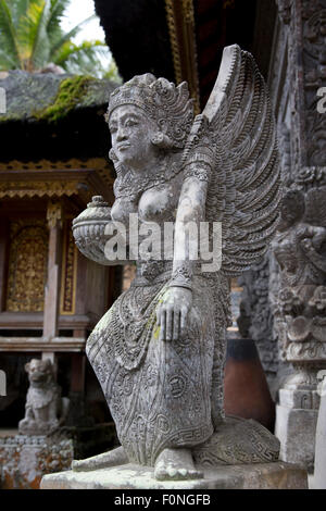 Dvarapala guardian statue at Balinese Hindu sea temple (Pura Segara ...