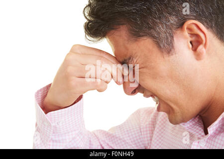 Pinching the bridge of her nose with closed eyes indicates a mood of ...