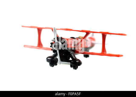 A red biplane isolated on a white background Stock Photo - Alamy