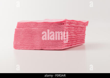 pile of pink tissues on a white background Stock Photo - Alamy