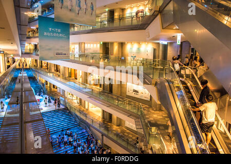 Interior of Omotesando Hills, shopping mall designed by Tadao Ando in ...