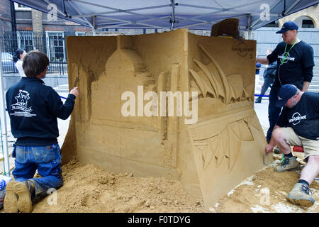 A sand sculpture calving famous landmarks on top five destinations of ...