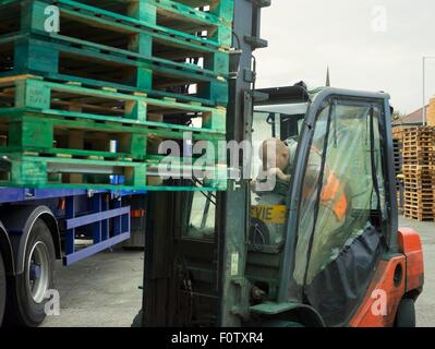 Pallet Truck Loading Stock Photo - Alamy
