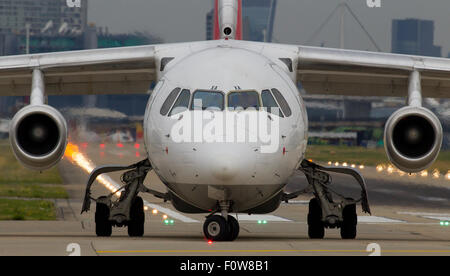 A CityJet Avro RJ85 registration EI-RJI deploys its tail air brake as ...