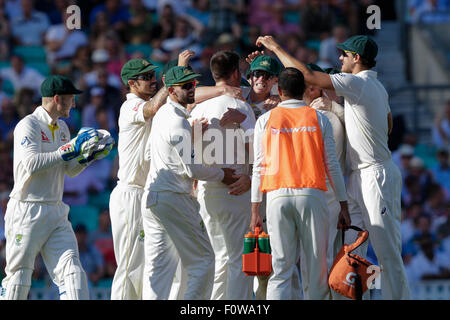England players celebrate taking the wicket of New Zealand's Daryl ...