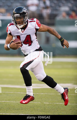 Atlanta Falcons receiver Eric Weems (14) spins away from New England ...