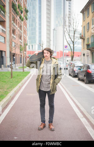 Portrait of man with moustache posing in vintage sportswear and red ...