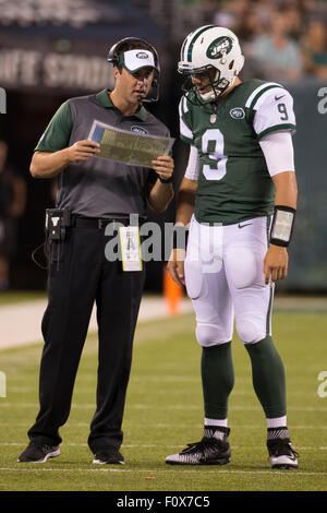 New York Jets quarterbacks coach Charles London heads to the field ...