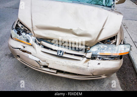 Road accident. Car with the front bumper ripped off following a ...