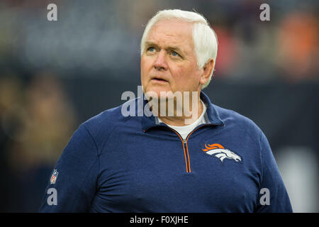 Wade Phillips, Denver Broncos Defensive Coordinator, right, and Reggie ...