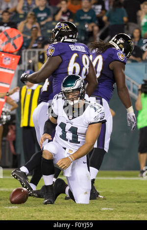 Baltimore Ravens linebacker Za'Darius Smith (90) and Kenny Young (40 ...