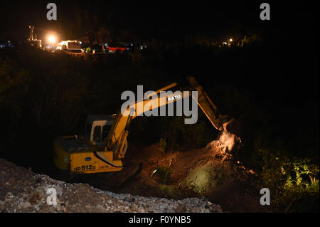 Funing, China's Yunnan Province. 23rd Aug, 2015. Rescuers search for ...