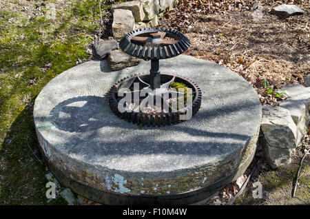 Parts of an old mill stone at Mill of Kintail Almonte Ontario Stock ...