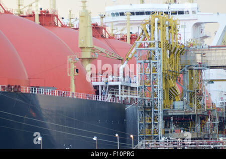 Loading arm, transporting gas LNG from station to LNG Tanker Stock ...