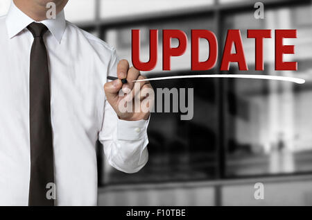 update is written by businessman background concept Stock Photo - Alamy