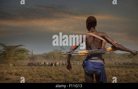 Man carrying gun for protection at a farm in rural South Africa Stock ...