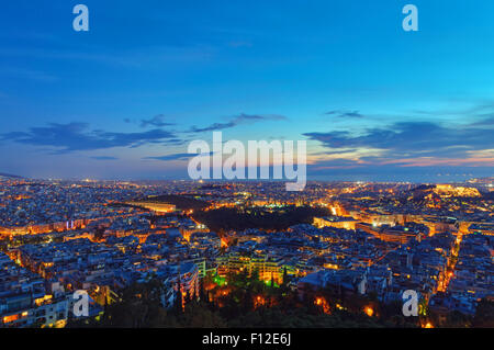 Athens after sunset with a view of the Parthenon on the Acropolis, the ...