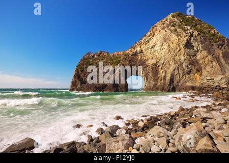 The rocky coastline of the Izu Peninsula in Japan on a beautiful bright ...