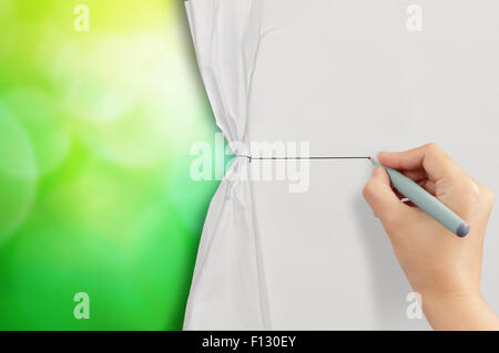 hand open crumpled paper to show dream house and green nature ...