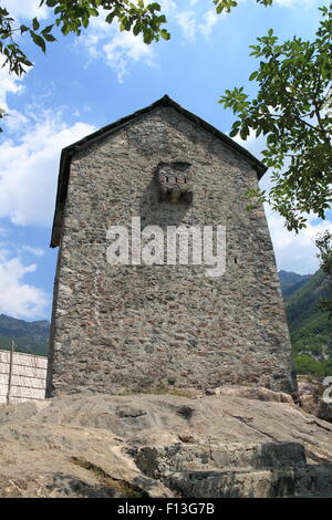 The Kulla, lock-in tower at Theth, with the Albanian Alps in the ...