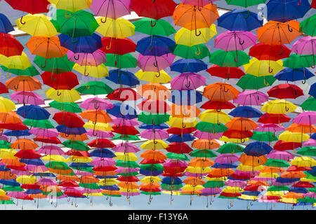 Lots of umbrellas coloring the sky in the city of Agueda, Portugal ...