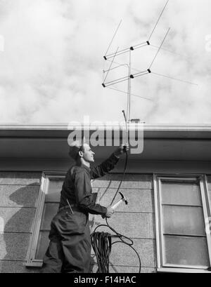 Old fashion antenna on a roof, television for all Stock Photo - Alamy