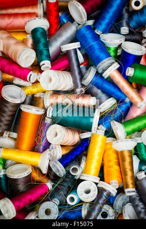 sewing spools of coloured threads UK Stock Photo - Alamy