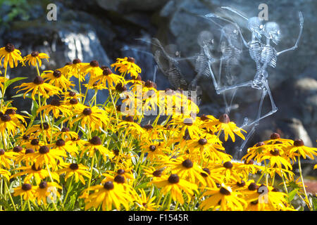 Scary dancing fairy skeleton spirits on flower background Stock Photo ...