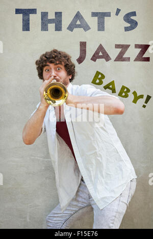 Curly haired man plays jazz trumpet outside Stock Photo - Alamy