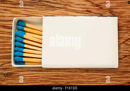Blue matches in open box Stock Photo - Alamy