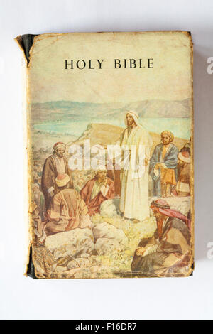 Old tatty worn out Christian bibles of different versions on a ...