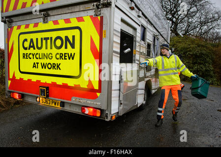 Kerbside recycling collection lorry and workers in rural area Stock ...