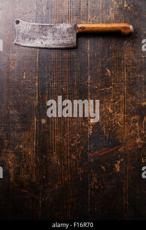 Vintage Meat cleaver on dark wooden background with copy space Stock ...