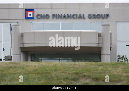 A logo sign outside of the headquarters of the CNO Financial Group, in ...