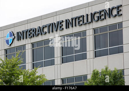 A logo sign outside of the headquarters of Interactive Intelligence ...