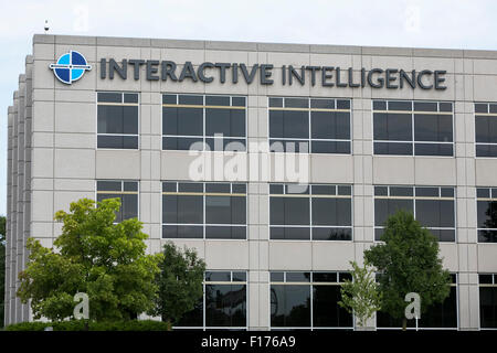 A logo sign outside of the headquarters of Interactive Intelligence ...