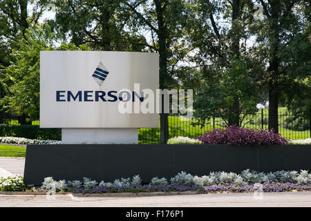 A logo sign outside of the headquarters of Emerson Electric, in ...