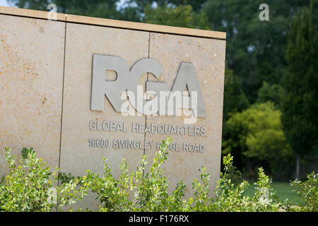 A logo sign outside of the headquarters of Reinsurance Group of America ...