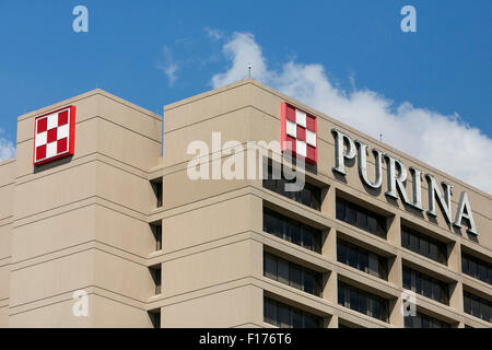 A logo sign outside of the headquarters of the Nestlé Purina PetCare ...