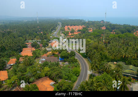 Anyer coastline and a coastal road are seen from Cikoneng Lighthouse ...