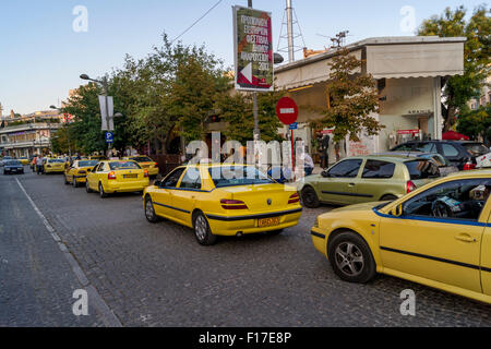Yellow Greek taxi cab in Athens, Greece Stock Photo - Alamy