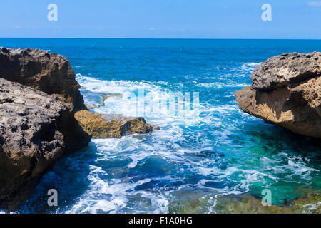 The foamy waves splashing a shore line, beautiful seascap Stock Photo ...