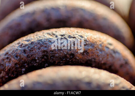 A selective focus shot of rusty metal mesh against the wall Stock Photo ...